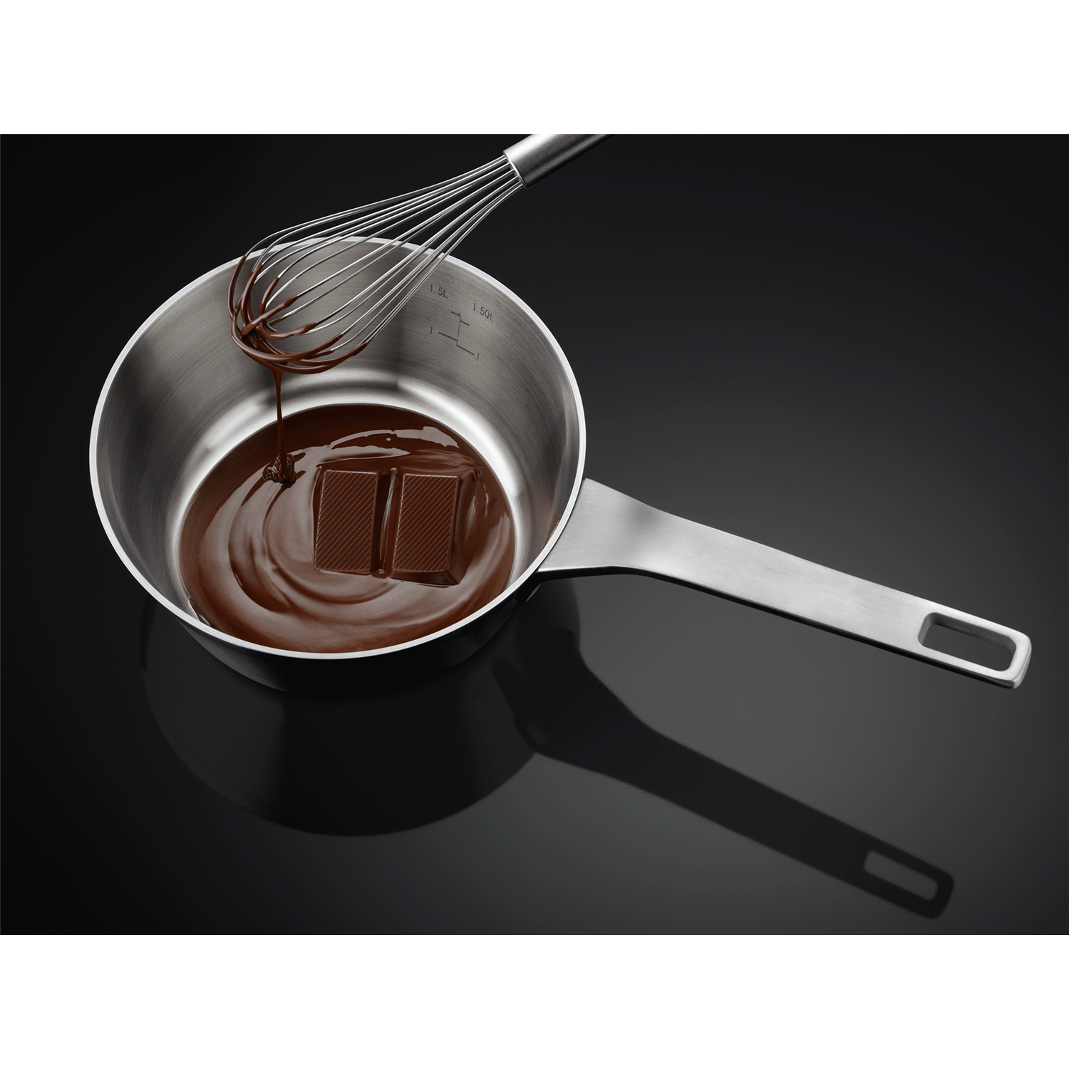 60cm 3 zone induction cooktop with ProCook & FlexiBridge - IKE63471FB | AEG